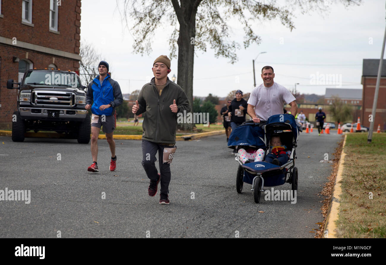 Runners participate in the 2017 Marine Corps Marathon Turkey Trot, held ...