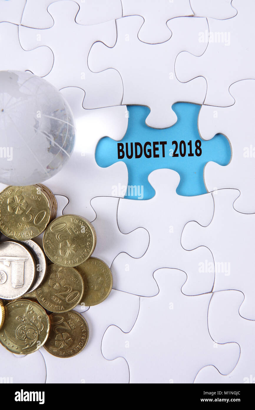 BUDGET 2018 CONCEPT with printed words on the jigsaw puzzle Stock Photo ...