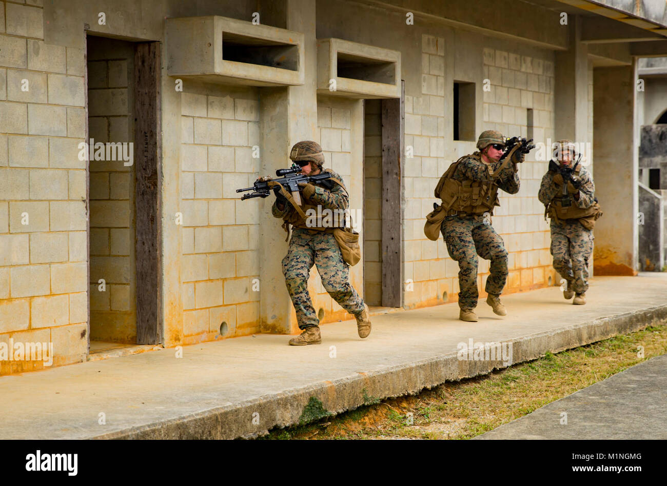U.S. Marines maneuver from room to room during military operations in ...