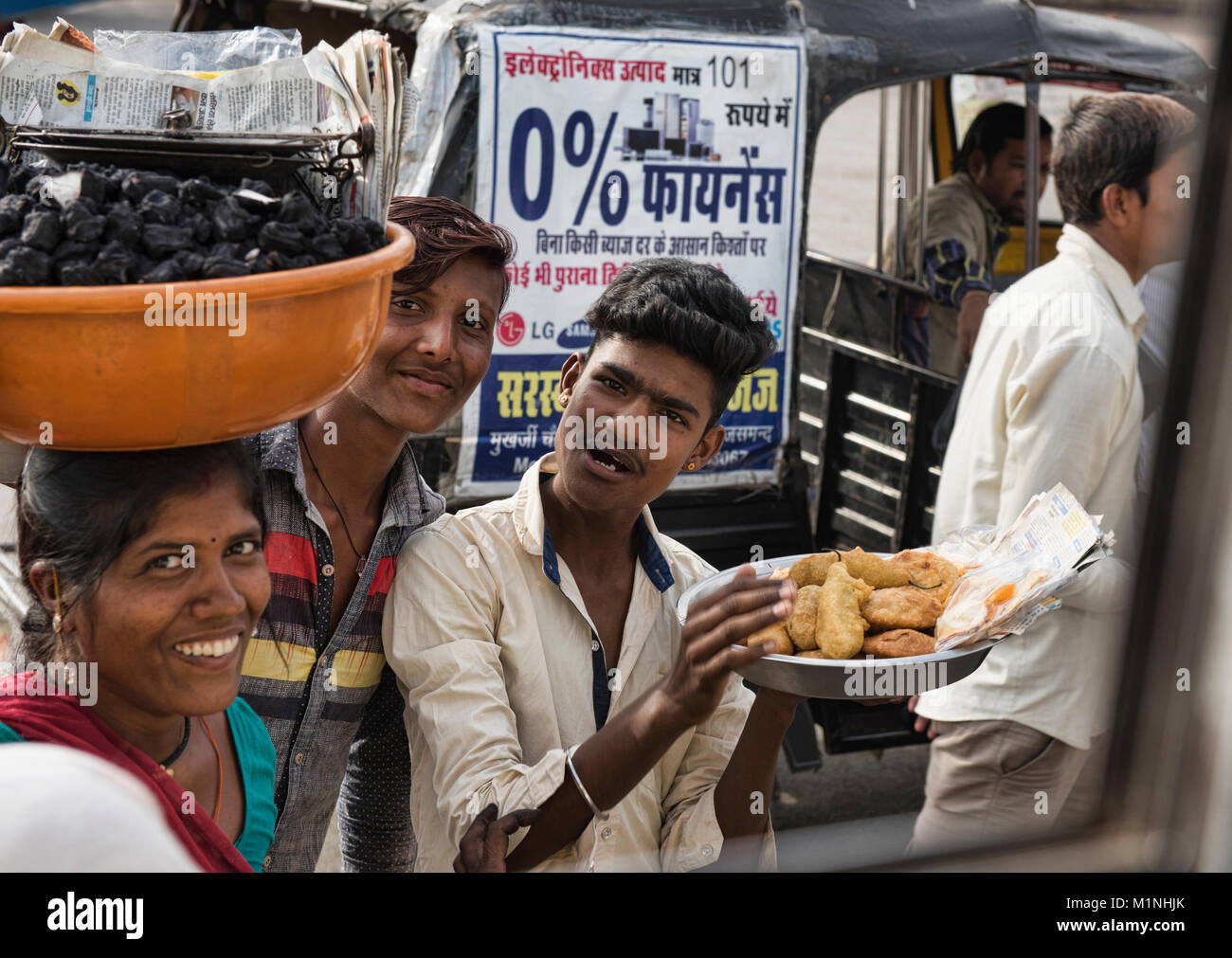 Vendors outside the bus window, Pushkar, Rajasthan, India Stock Photo ...