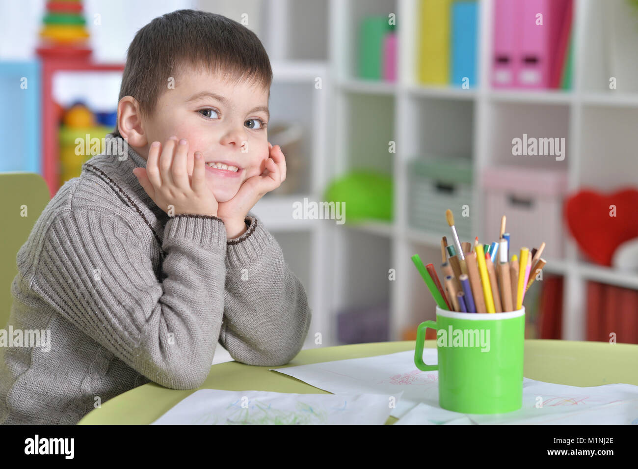 little boy drawing with pencil Stock Photo - Alamy