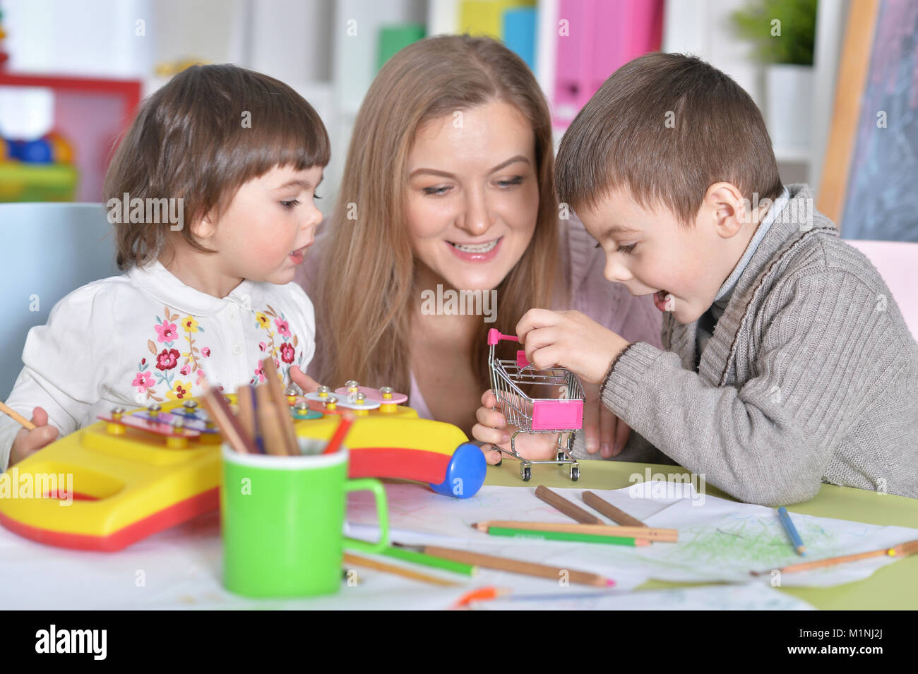 Happy family drawing Stock Photo - Alamy