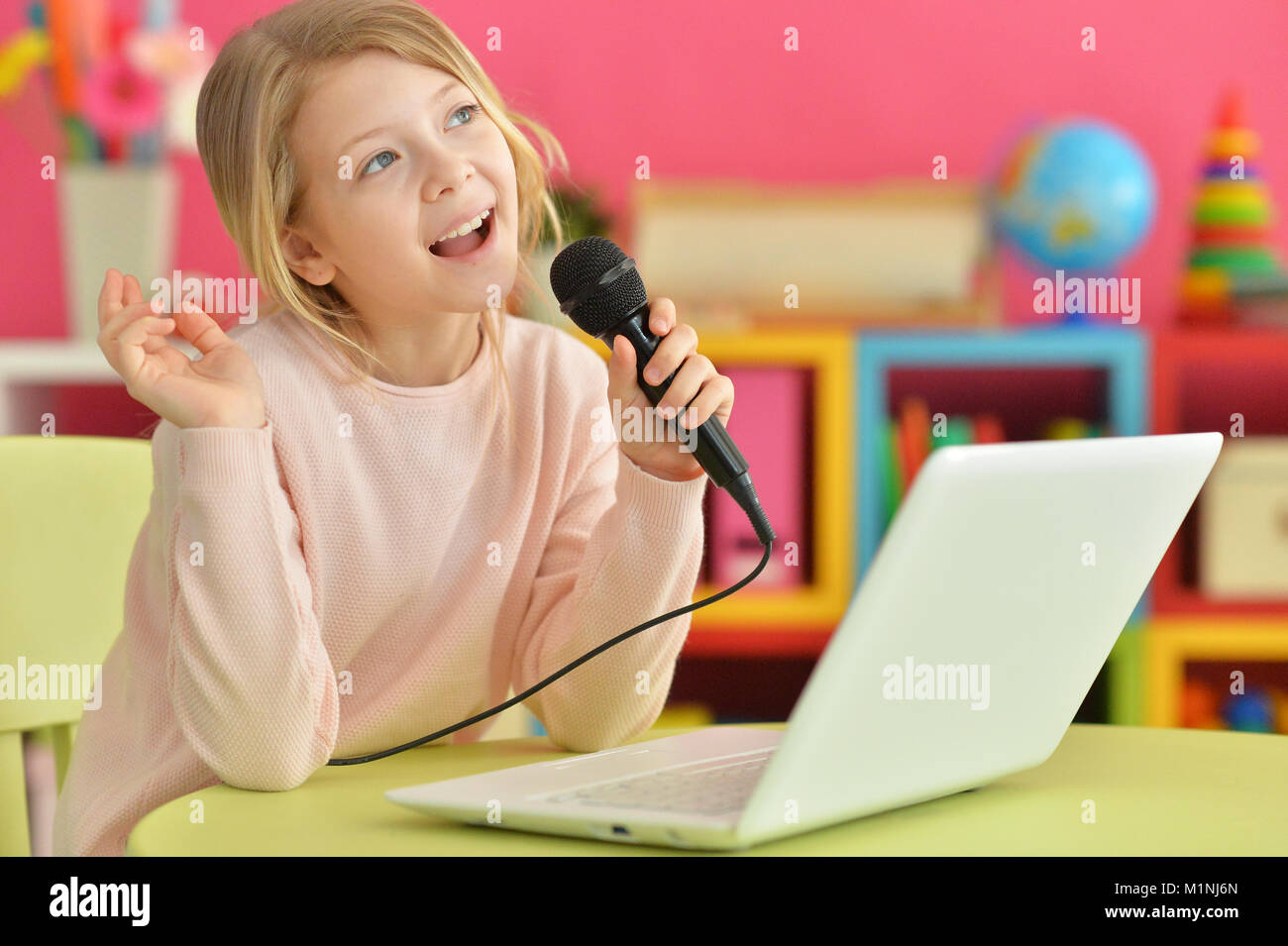 girl singing karaoke Stock Photo - Alamy