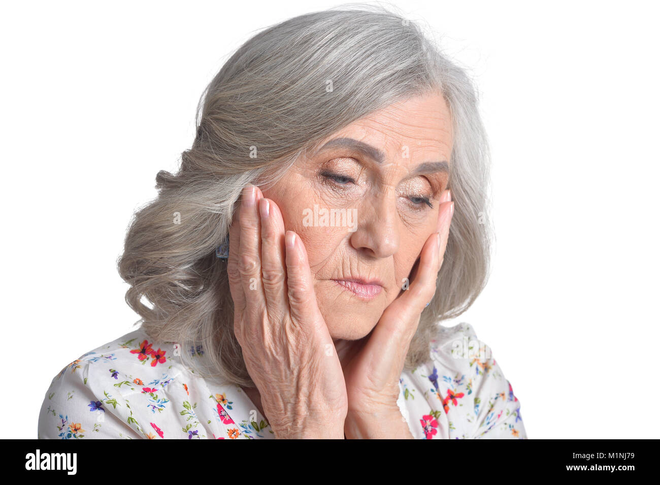 Sad senior woman isolated Stock Photo - Alamy