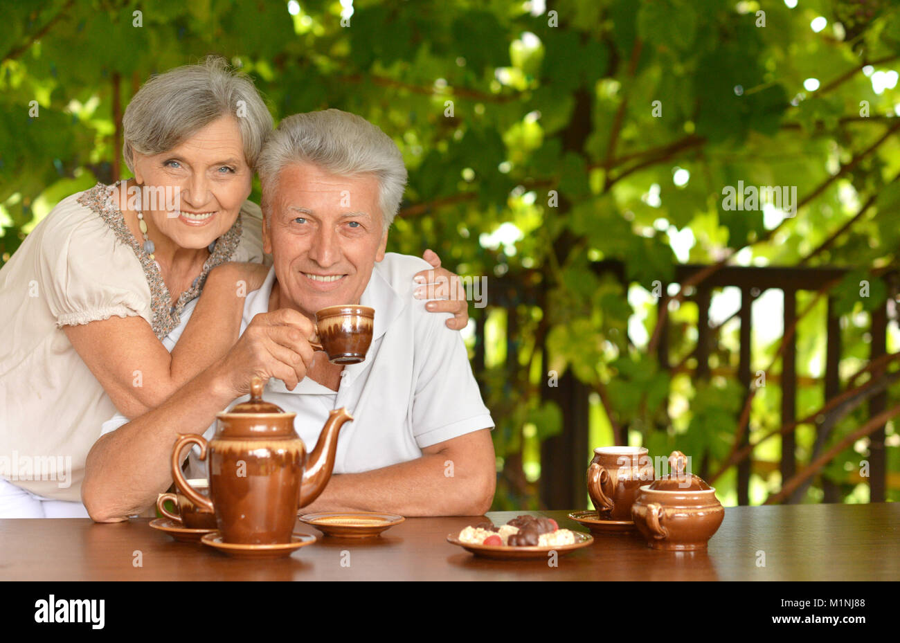 Couple drinking tea Stock Photo - Alamy