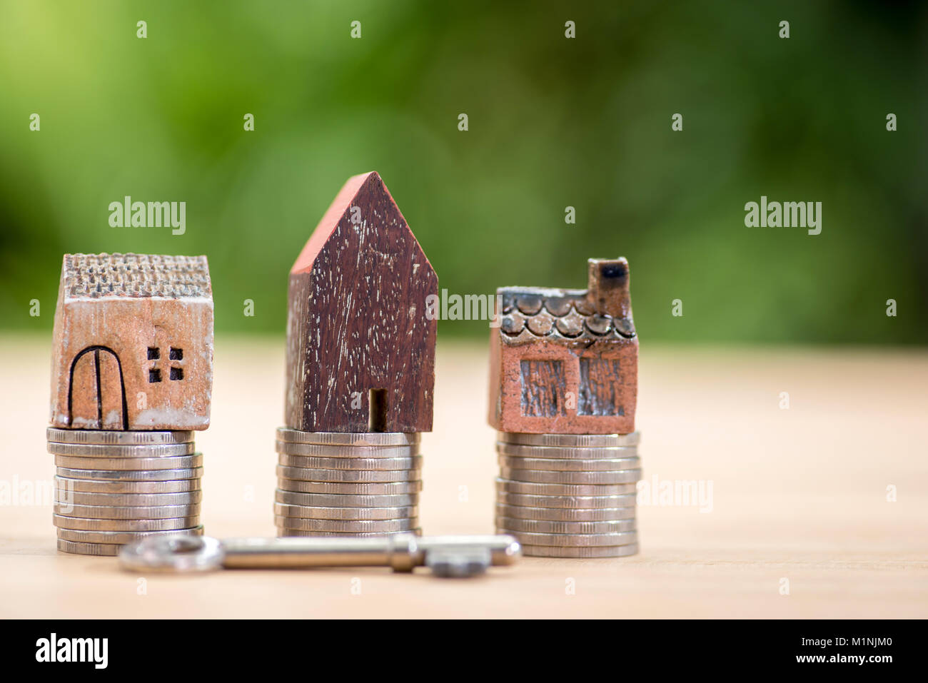 Mortgage concept. Money and house Stock Photo - Alamy