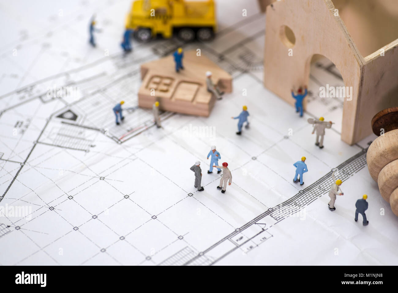 Miniature worker, The concept of construction site Stock Photo - Alamy