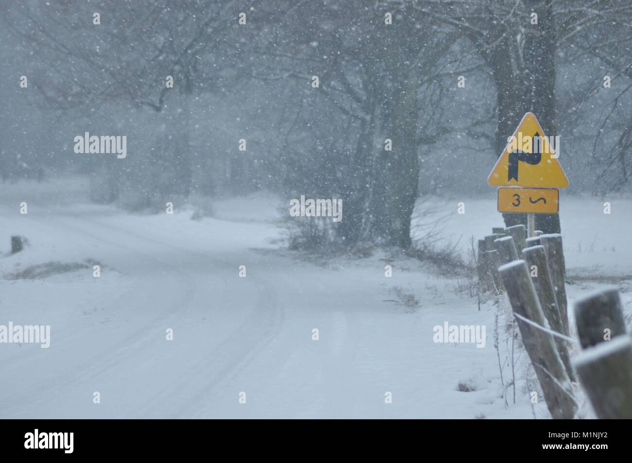 Road signs, the sign of the bend. Winding road. Slip by Stock Photo - Alamy