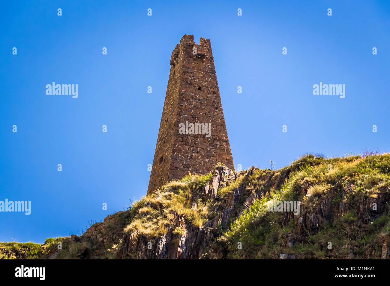 Old ancient stone towers of the fortress Stock Photo - Alamy