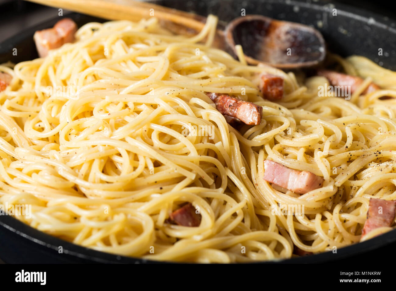 Close up of cooking traditional Italian pasta Carbonara in pan Stock ...