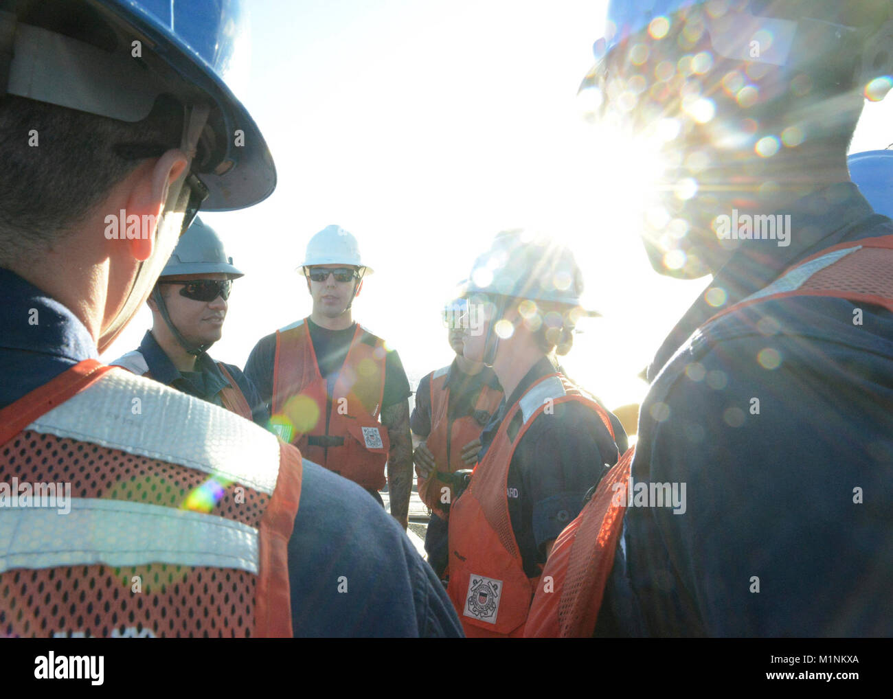 Crewmembers aboard the U.S. Coast Guard Cutter Sherman (WHEC 720), a ...