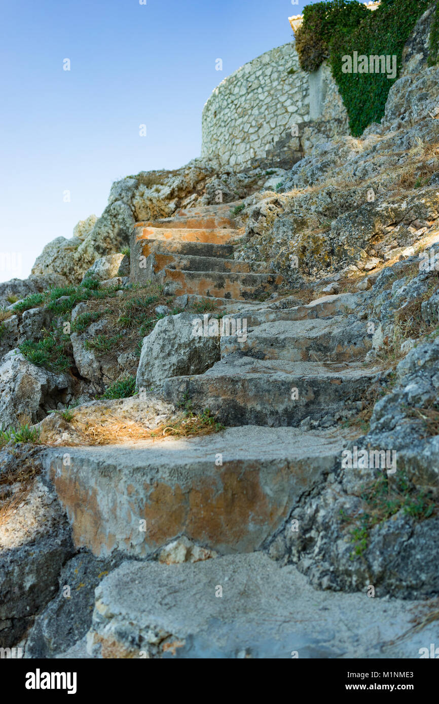 Ladder stairs in natural stone Stock Photo - Alamy