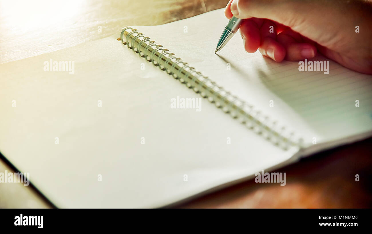 Writing Note on wooden table, Vintage picture tone Stock Photo - Alamy