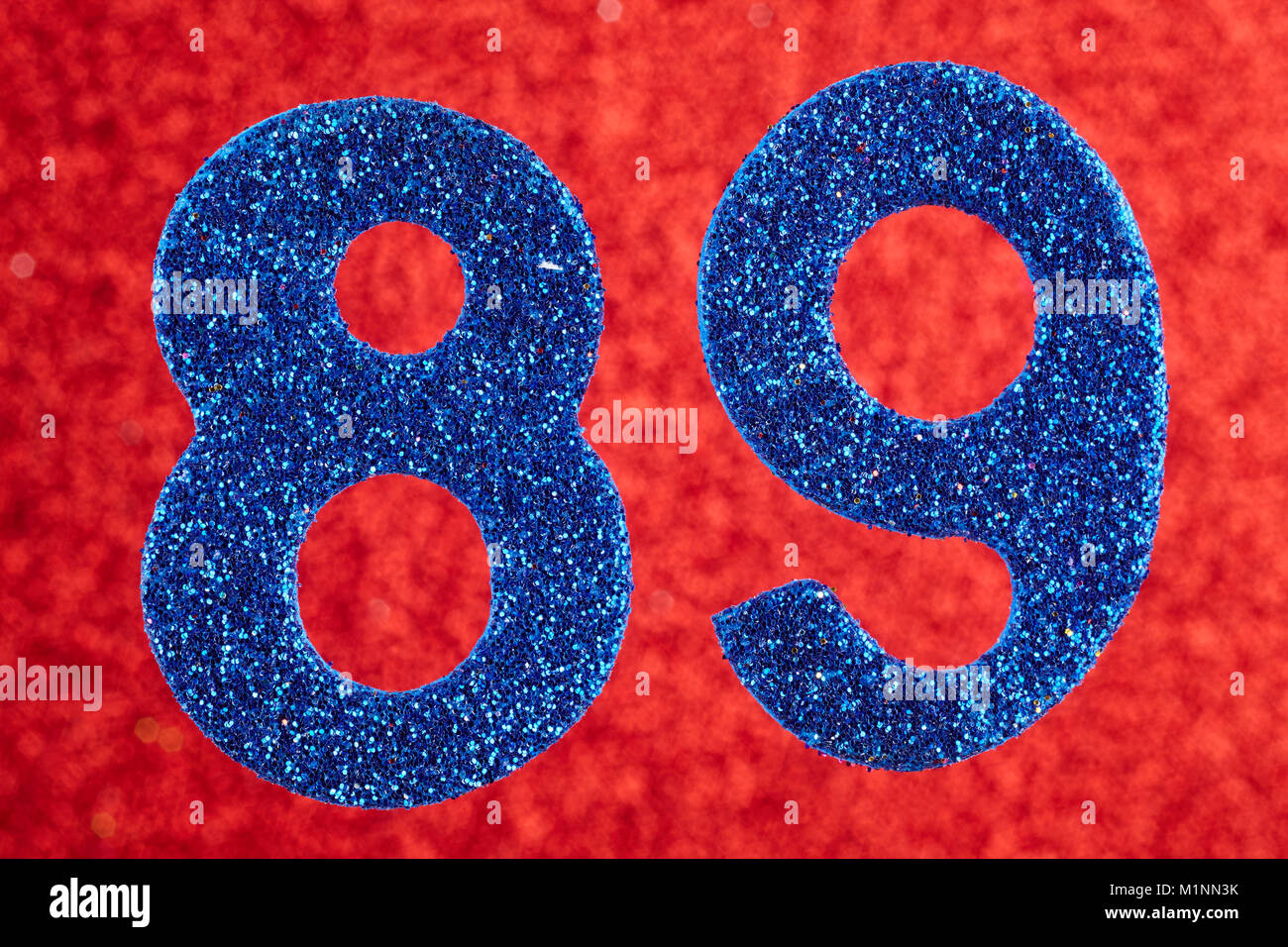 Number eighty-nine blue color over a red background. Anniversary ...