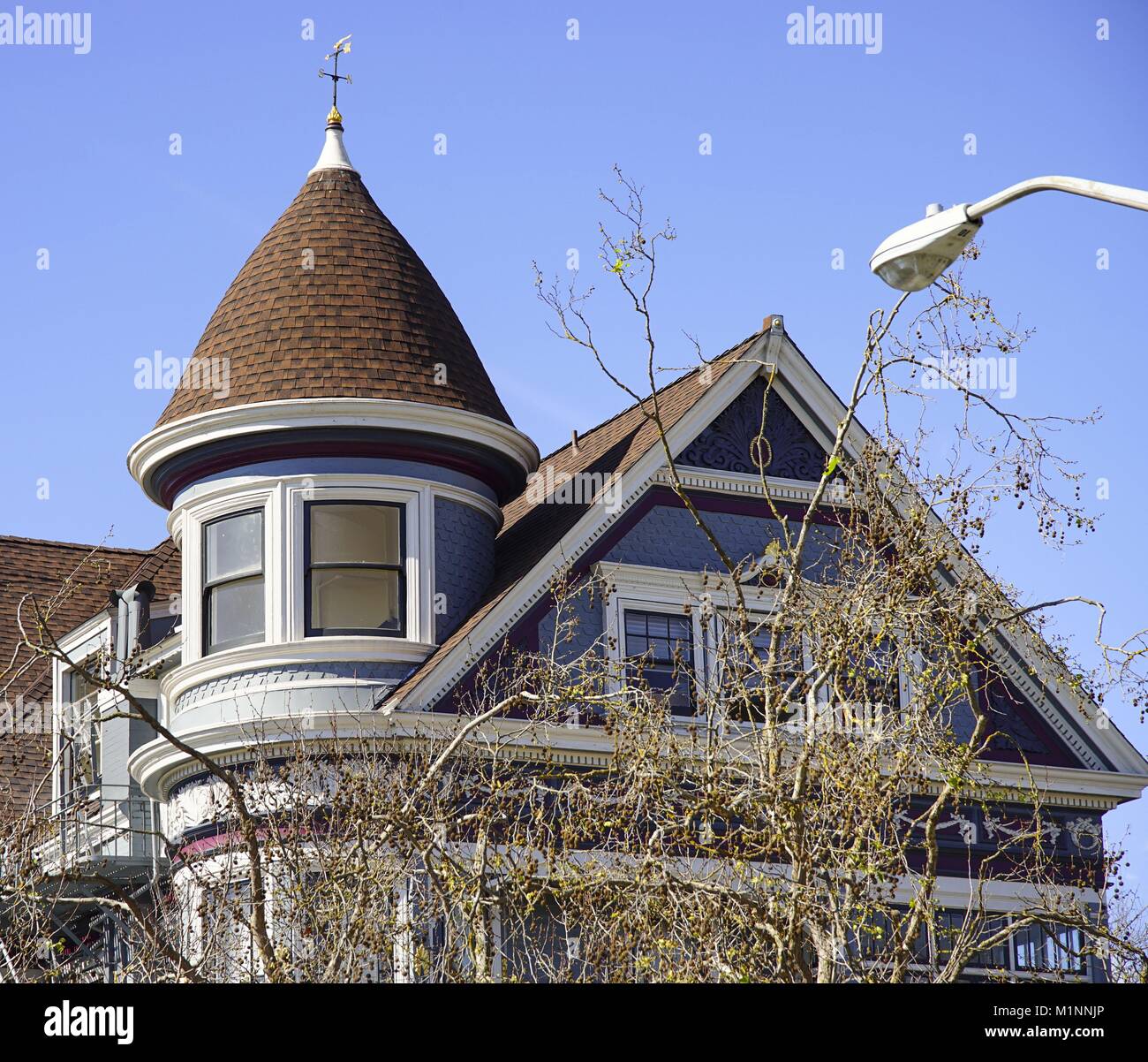 The gable of a house with turrets on Steiner Street in San Francisco ...