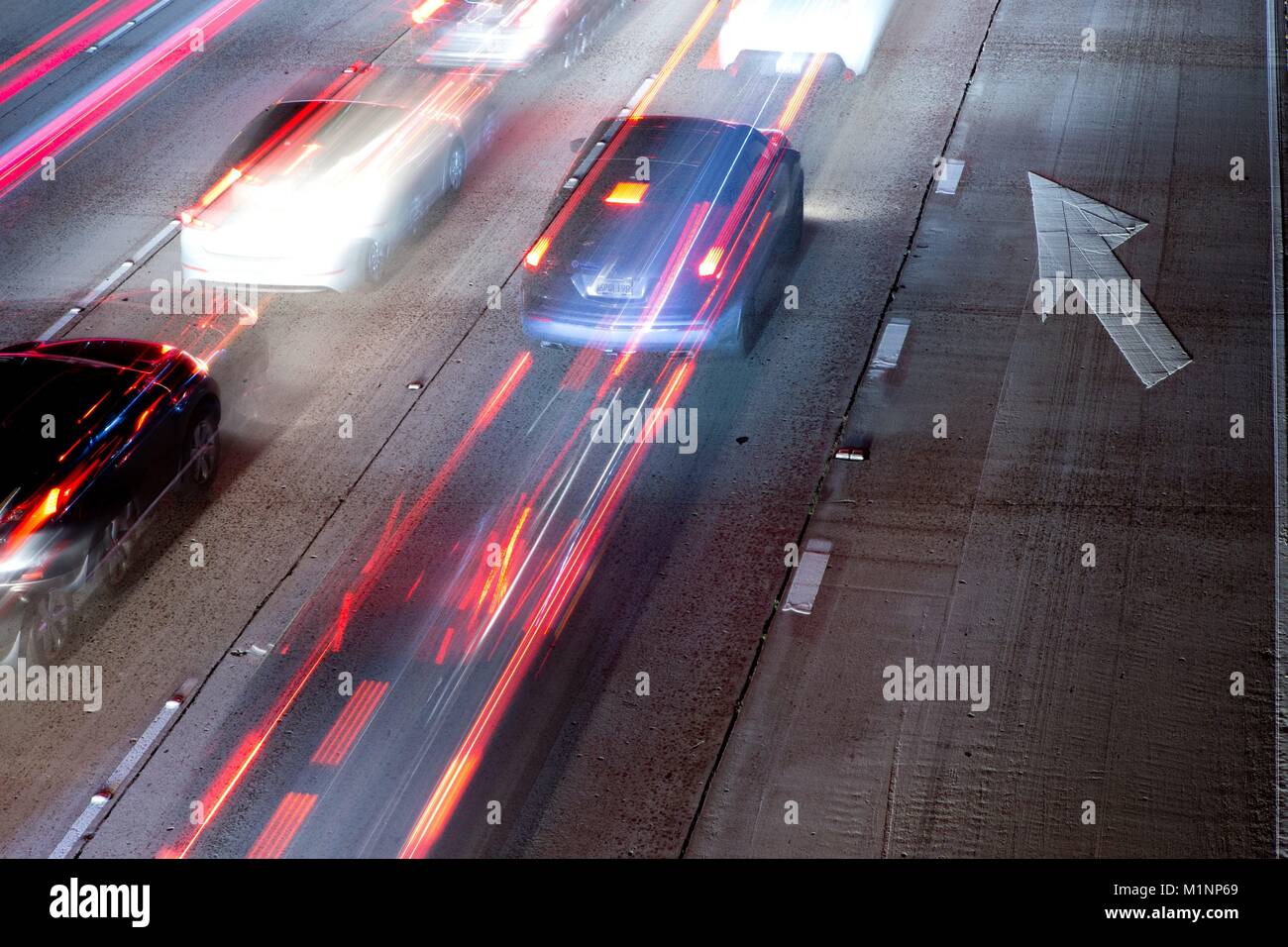 Arrow indicates a lane ending and prompts to merge left on highway 163 ...