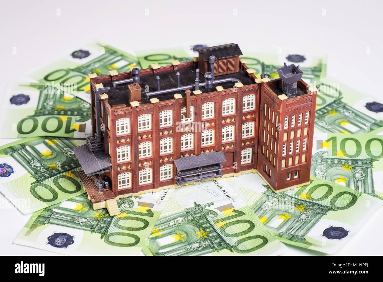 Factory building is surrounded by euro banknotes. | usage worldwide ...