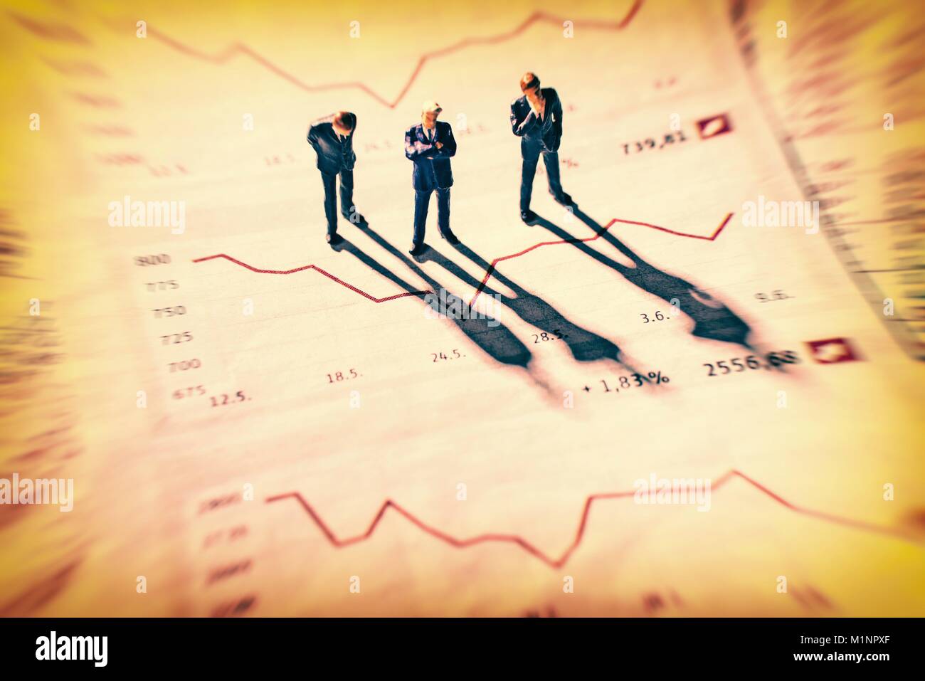 Businessmen are skeptical looking at stock market charts. | usage ...