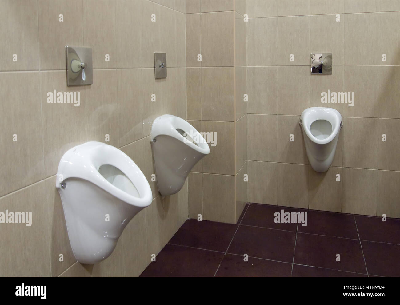 Urinals in the men's room Stock Photo - Alamy