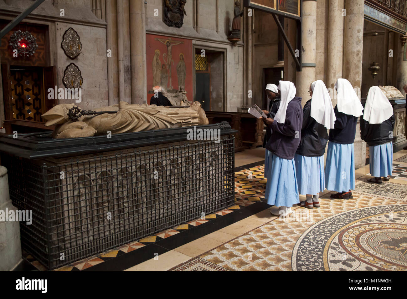 Germany, Cologne, nuns in front of the sarcophagus of archbishop ...