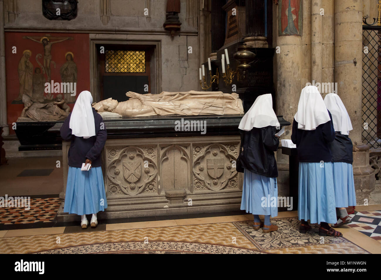 Germany, Cologne, nuns in front of the sarcophagus of archbishop ...