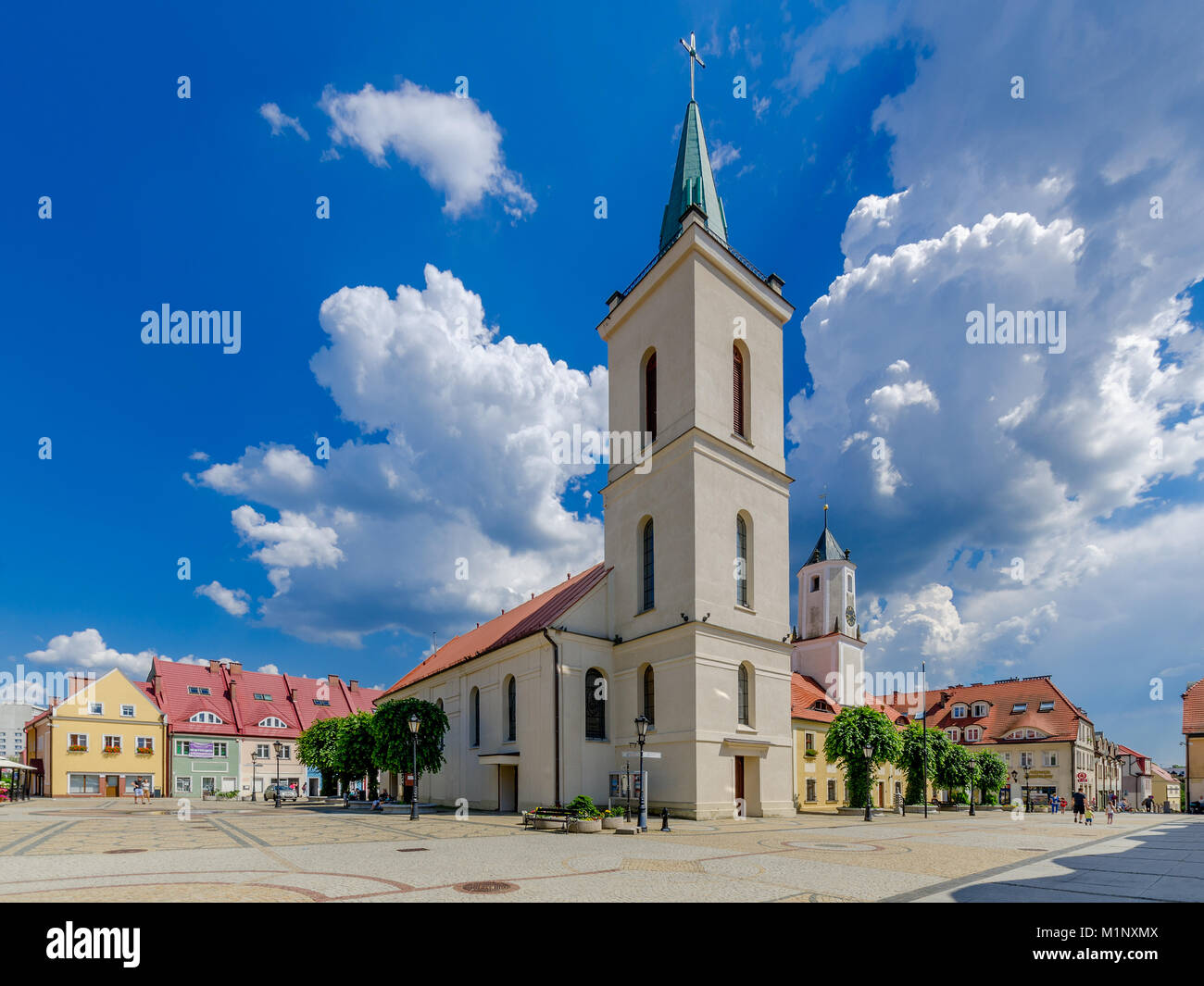 Town hall and parish church on Old market square in Polkowice, Lower ...