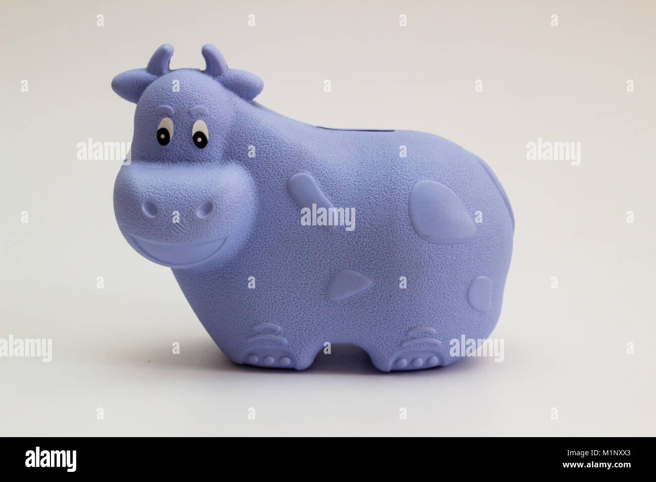money box cow on white background Stock Photo - Alamy