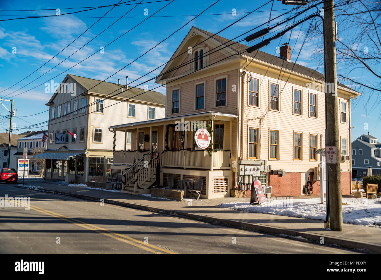 MYSTIC, CT - DECEMBER 17: cute buildings and shops downtown Mystic, on ...