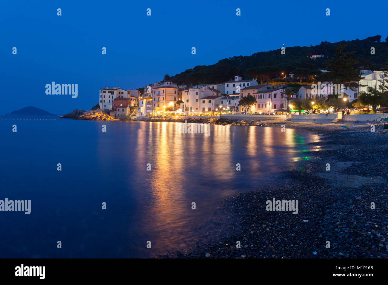 The old village of Marciana Marina at dusk, Elba Island, Livorno ...