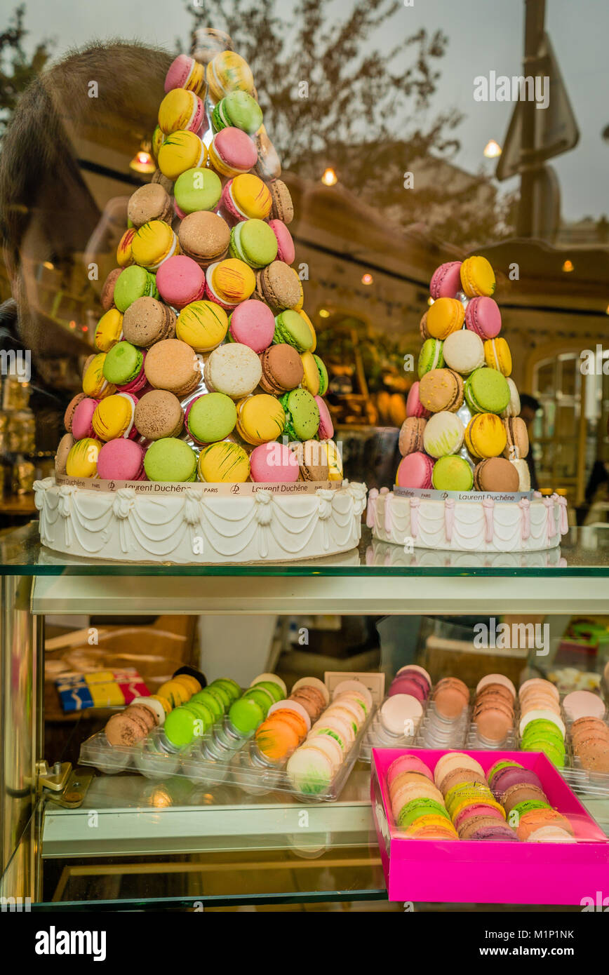 Tower of macarons in Paris in the display window of a shop Stock Photo ...