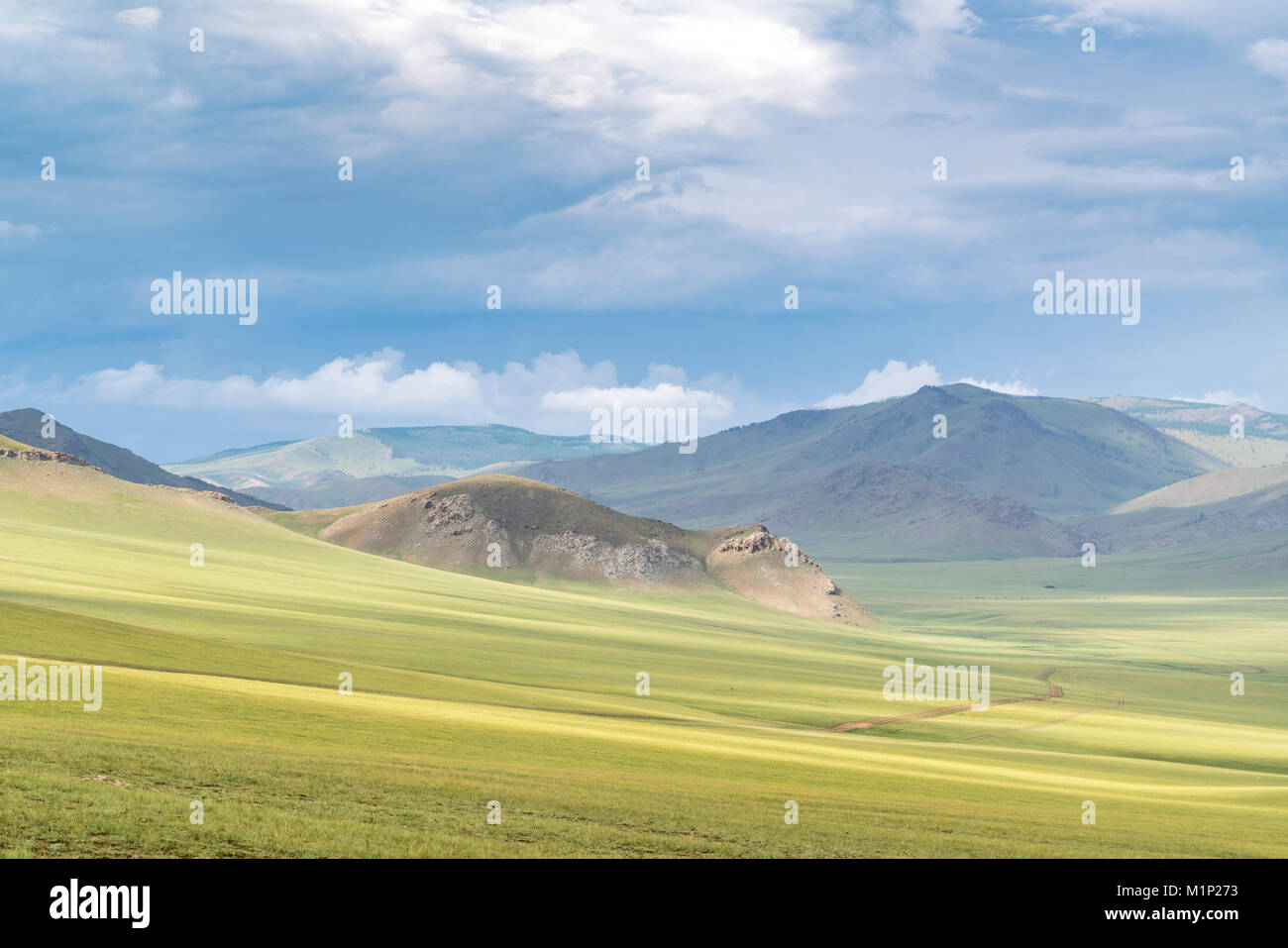 Landscape of the green Mongolian steppe under a gloomy sky, Ovorkhangai ...