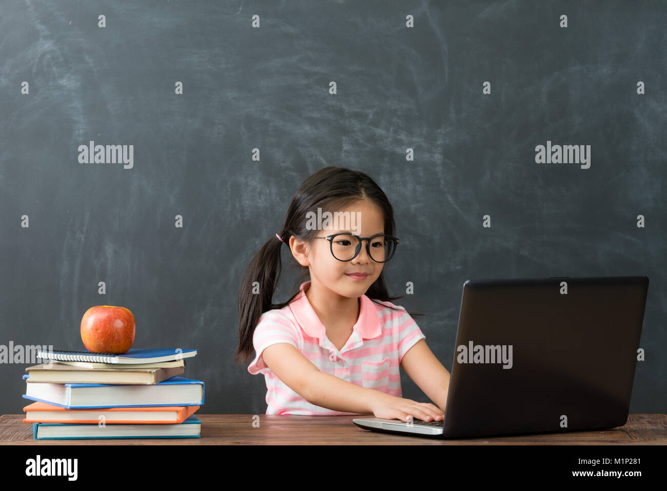 attractive beauty girl children using laptop computer doing homework ...