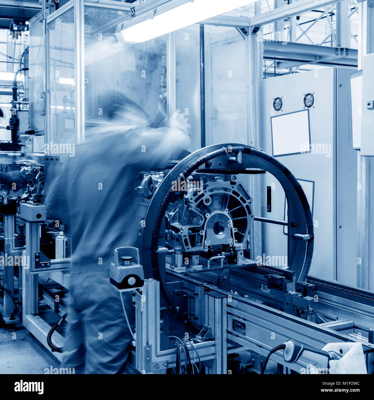 Car production line, skilled workers are working tense Stock Photo - Alamy