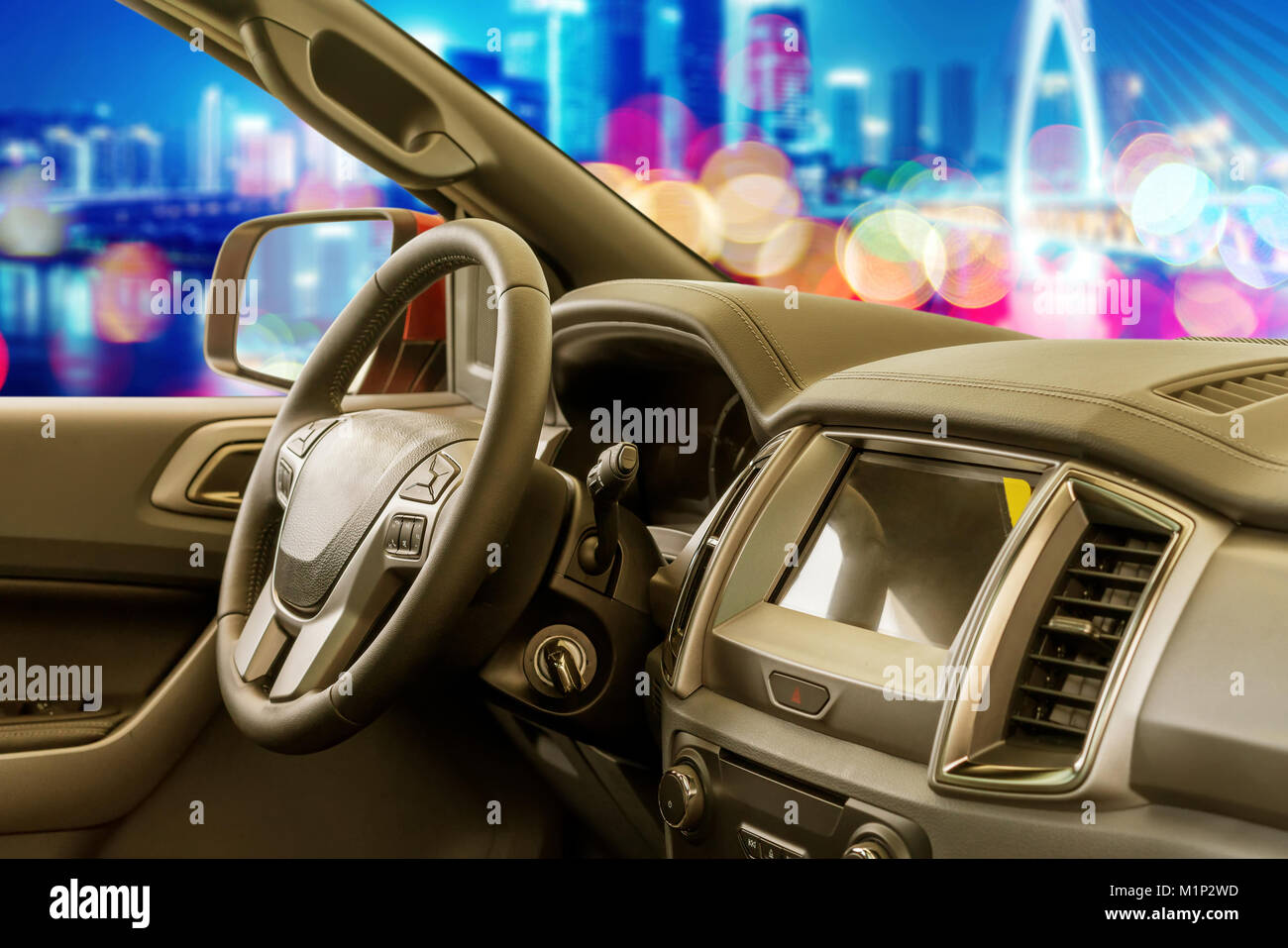Empty car parked at the curb at night city Stock Photo - Alamy