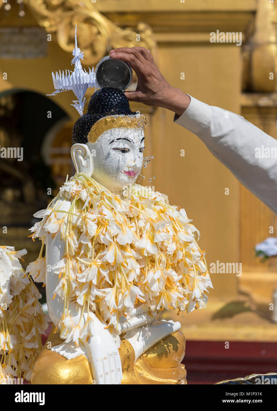 Ritual of pouring water over Buddha statue,Shwedagon Pagoda,Yangon ...