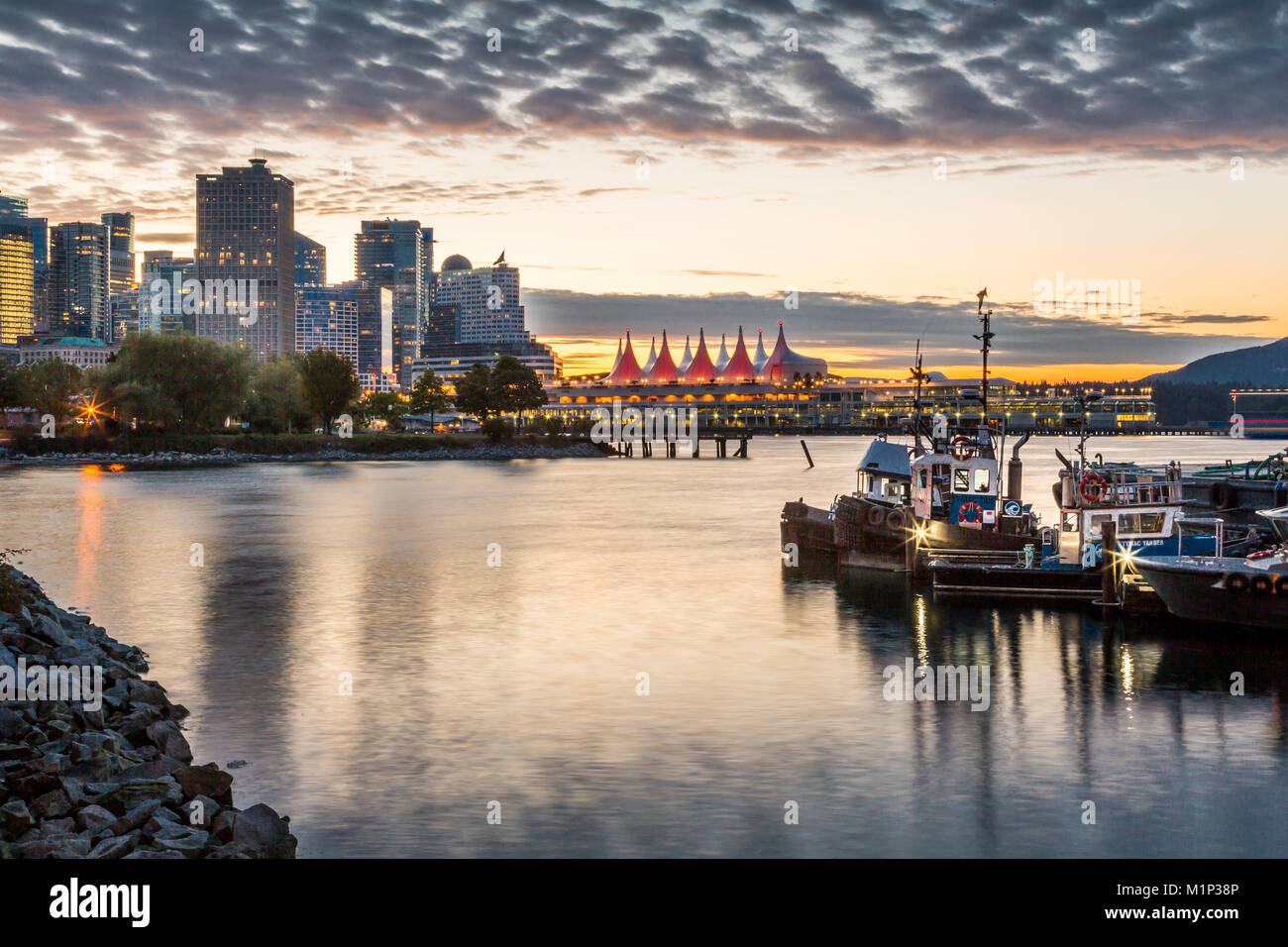 View of Canada Place and urban office buildings at sunset from CRAB ...