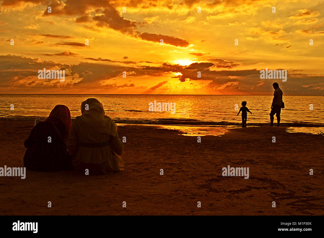 afternoon activities during sunset Stock Photo - Alamy