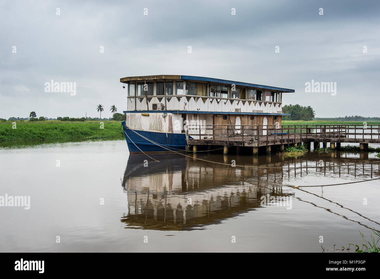 Boat from colonial times in Grand Bassam, UNESCO World Heritage Site ...