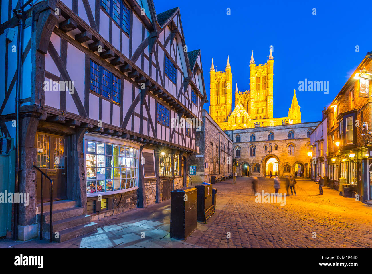 View of illuminated Lincoln Cathedral viewed from Exchequer Gate with ...
