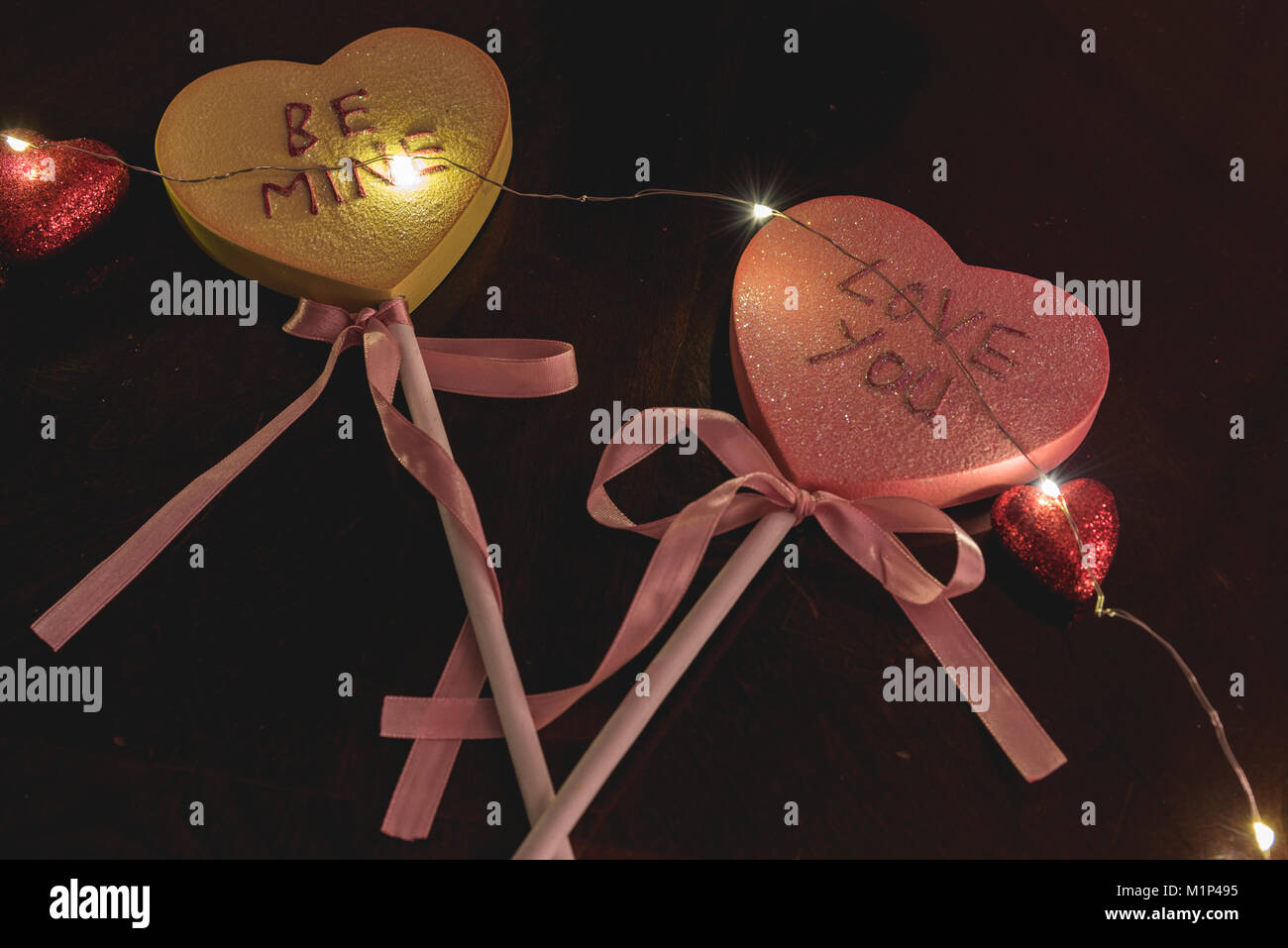 Be mine and Love you message hearts with smaller hearts laying on top ...