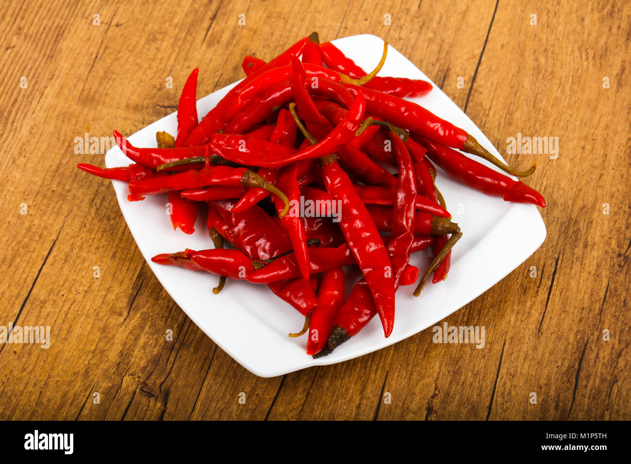 Pickled chili peppers Stock Photo - Alamy