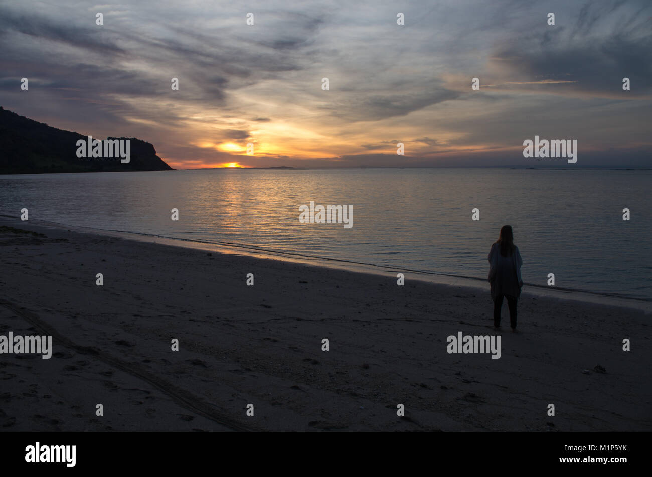 Epic sunset at a deserted beach near surf spot scar reef on Sumbawa ...