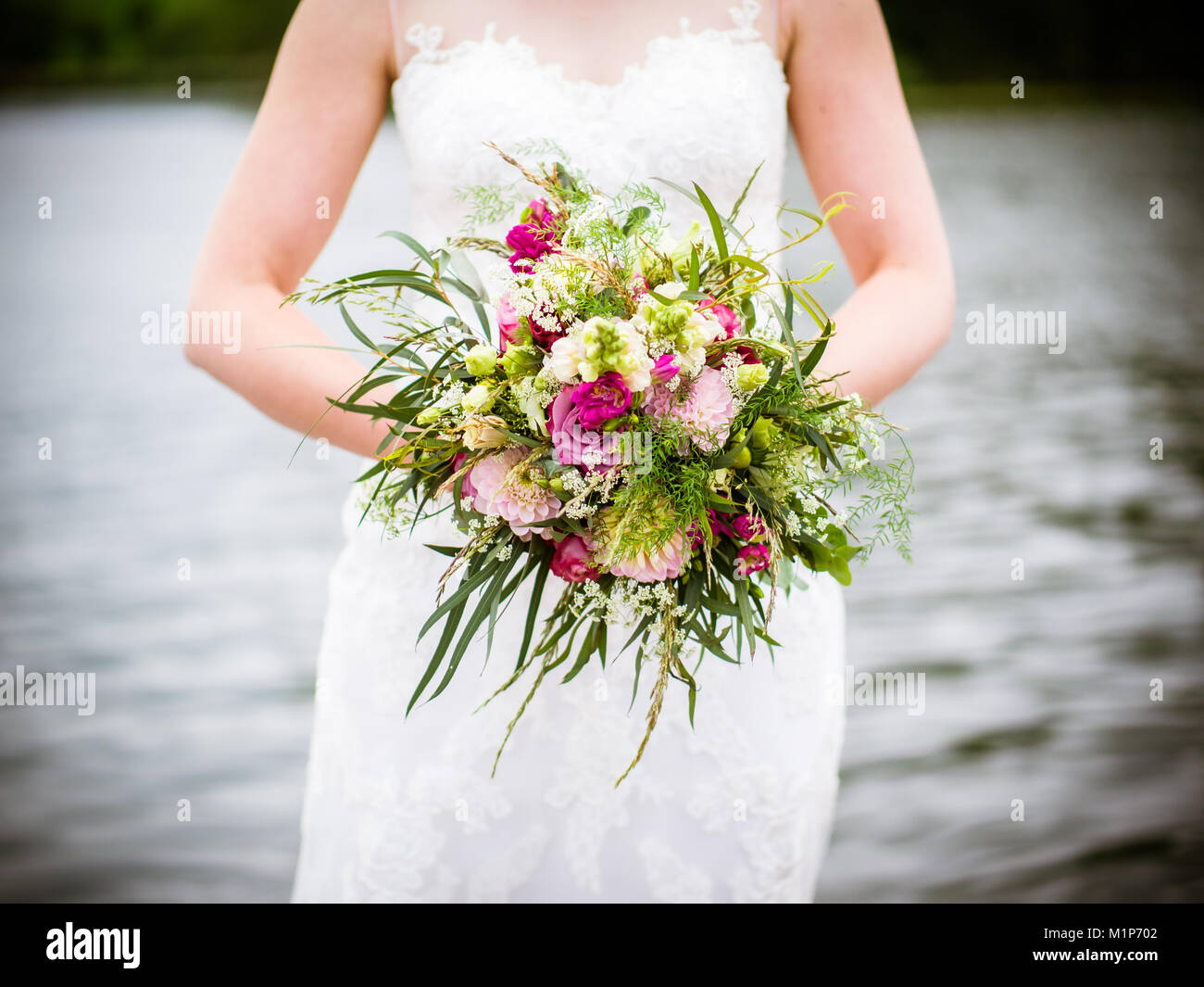 Bride holds beautiful wedding hi-res stock photography and images - Alamy