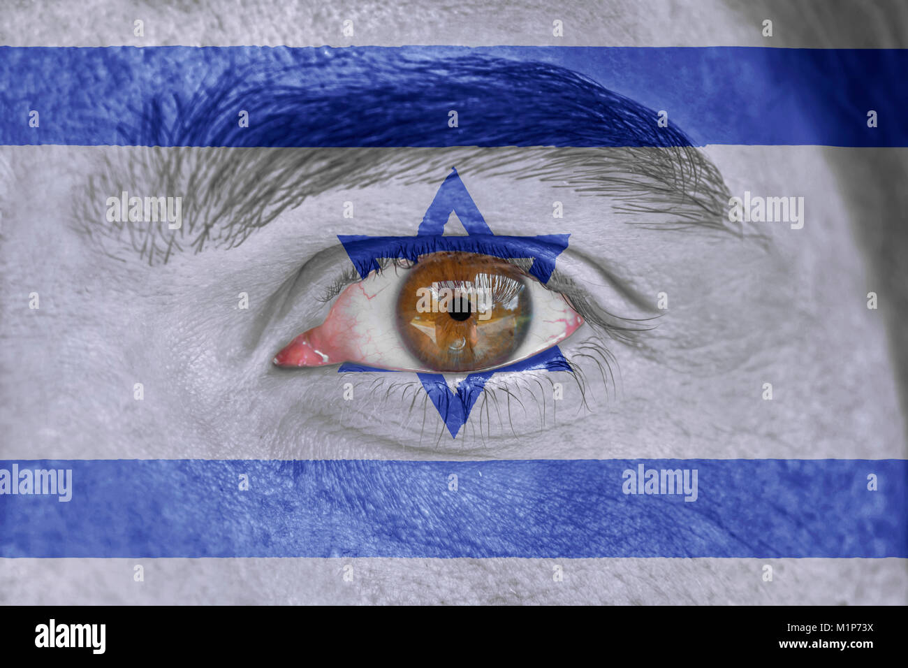 Human face and eye painted with flag of Israel Stock Photo - Alamy