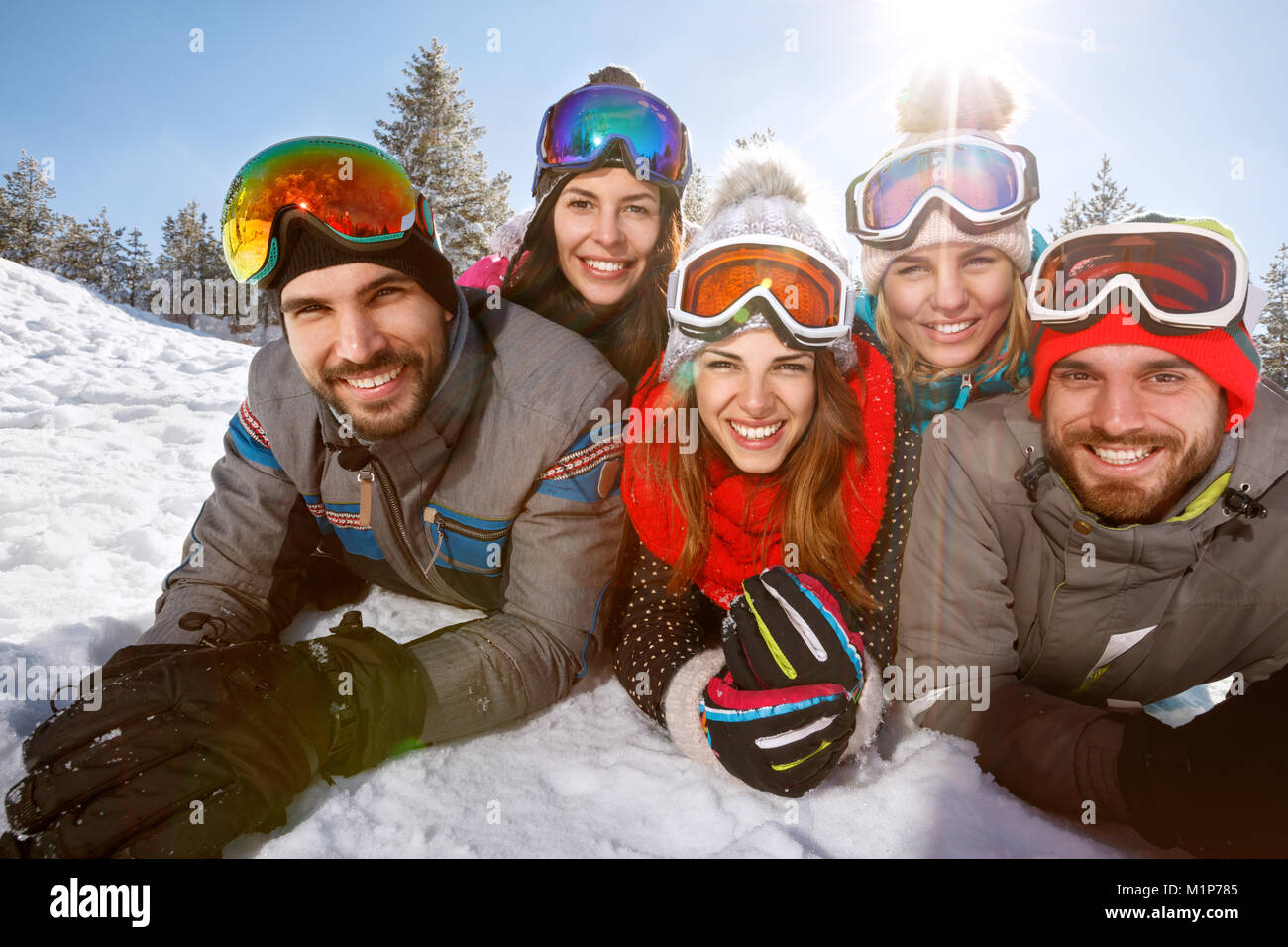 Group of skiers together on winter Stock Photo - Alamy