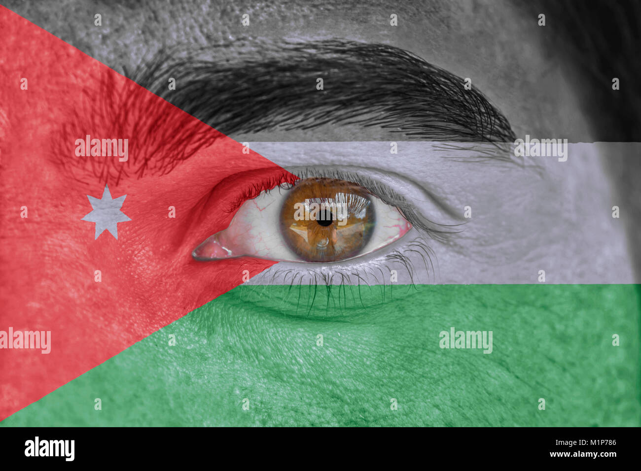 Human face and eye painted with flag of Jordan Stock Photo - Alamy