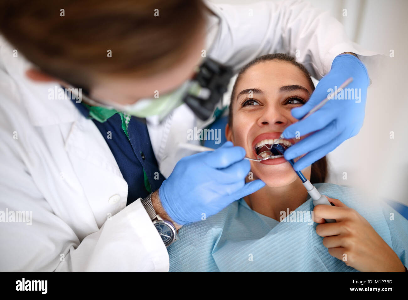 Young female patient on dental check up Stock Photo - Alamy