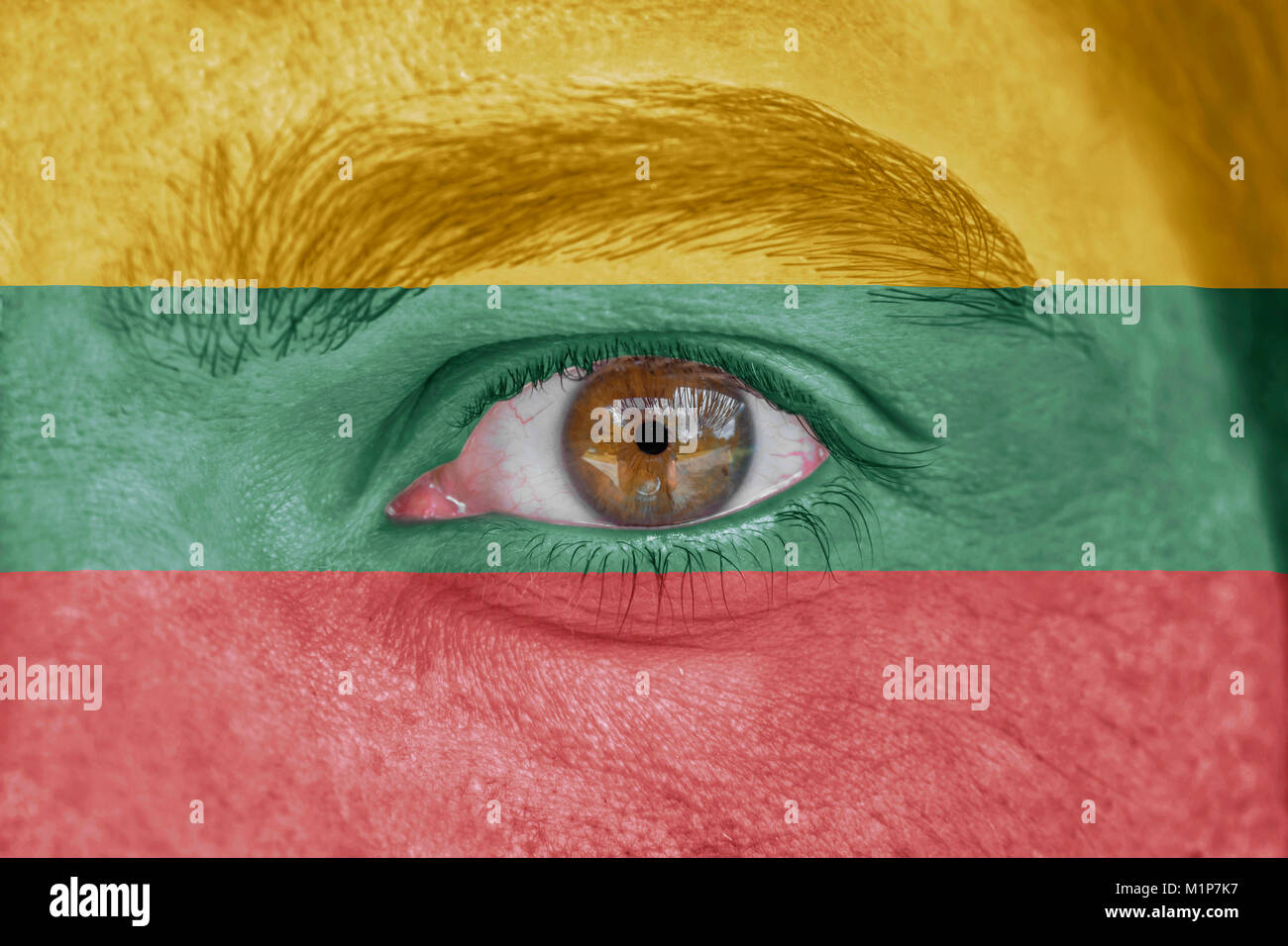 Human face and eye painted with flag of Lithuania Stock Photo - Alamy