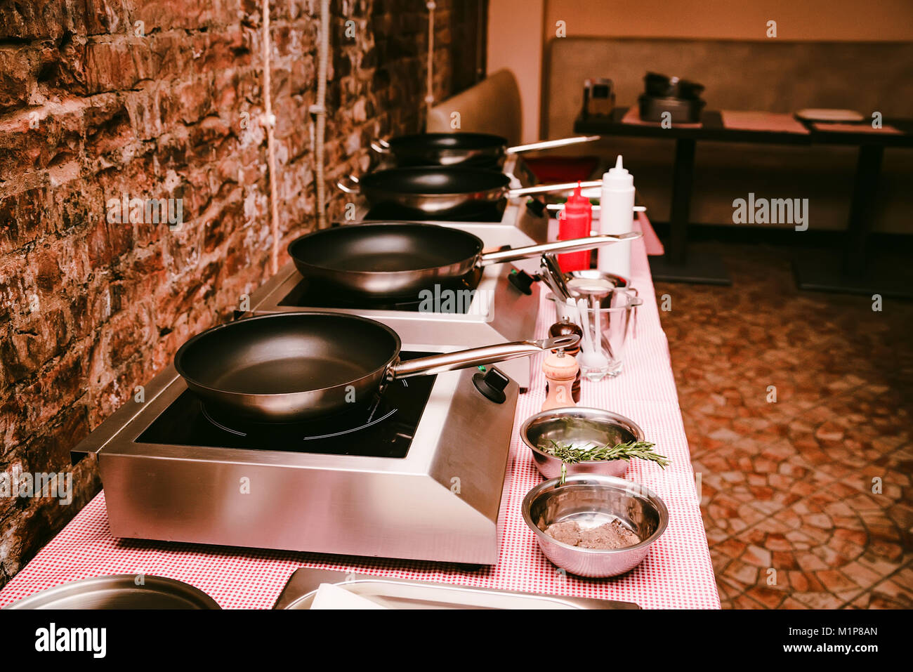 Interior of kitchen for cooking workshop Stock Photo - Alamy