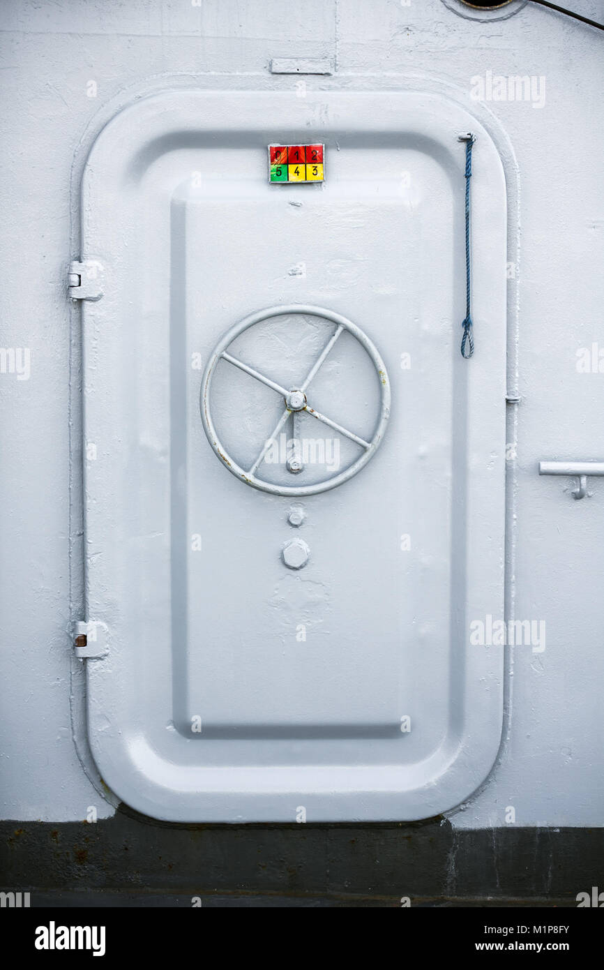 The closed door to the ship's compartment Stock Photo - Alamy